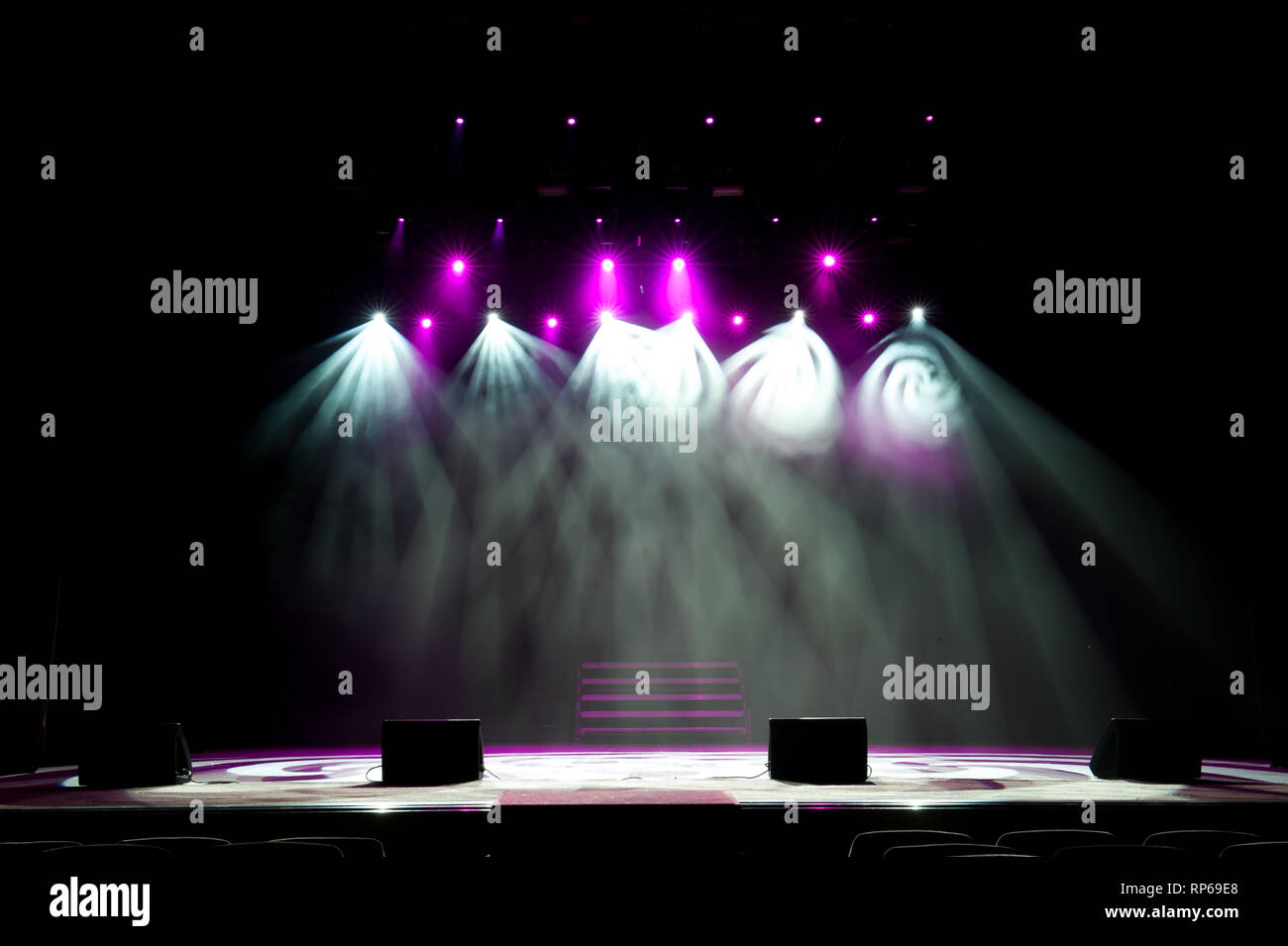 Free stage with lights, lighting devices. Night show Stock Photo - Alamy