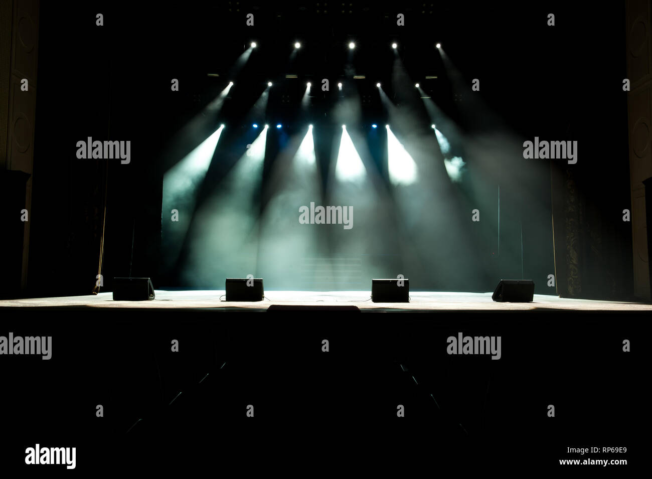 Free stage with lights, lighting devices. Night show Stock Photo - Alamy