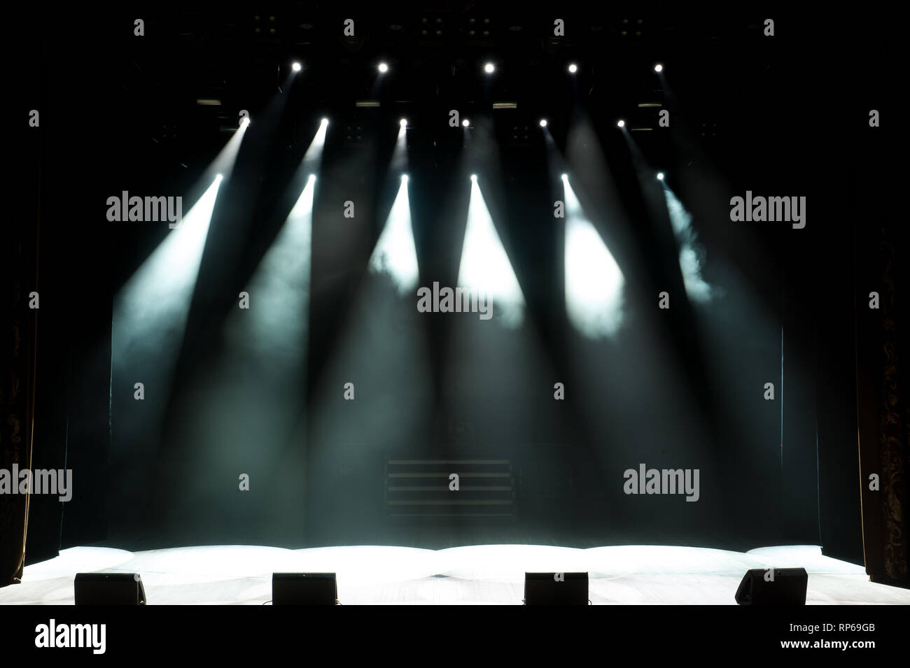 Free stage with lights, lighting devices. Night show Stock Photo - Alamy
