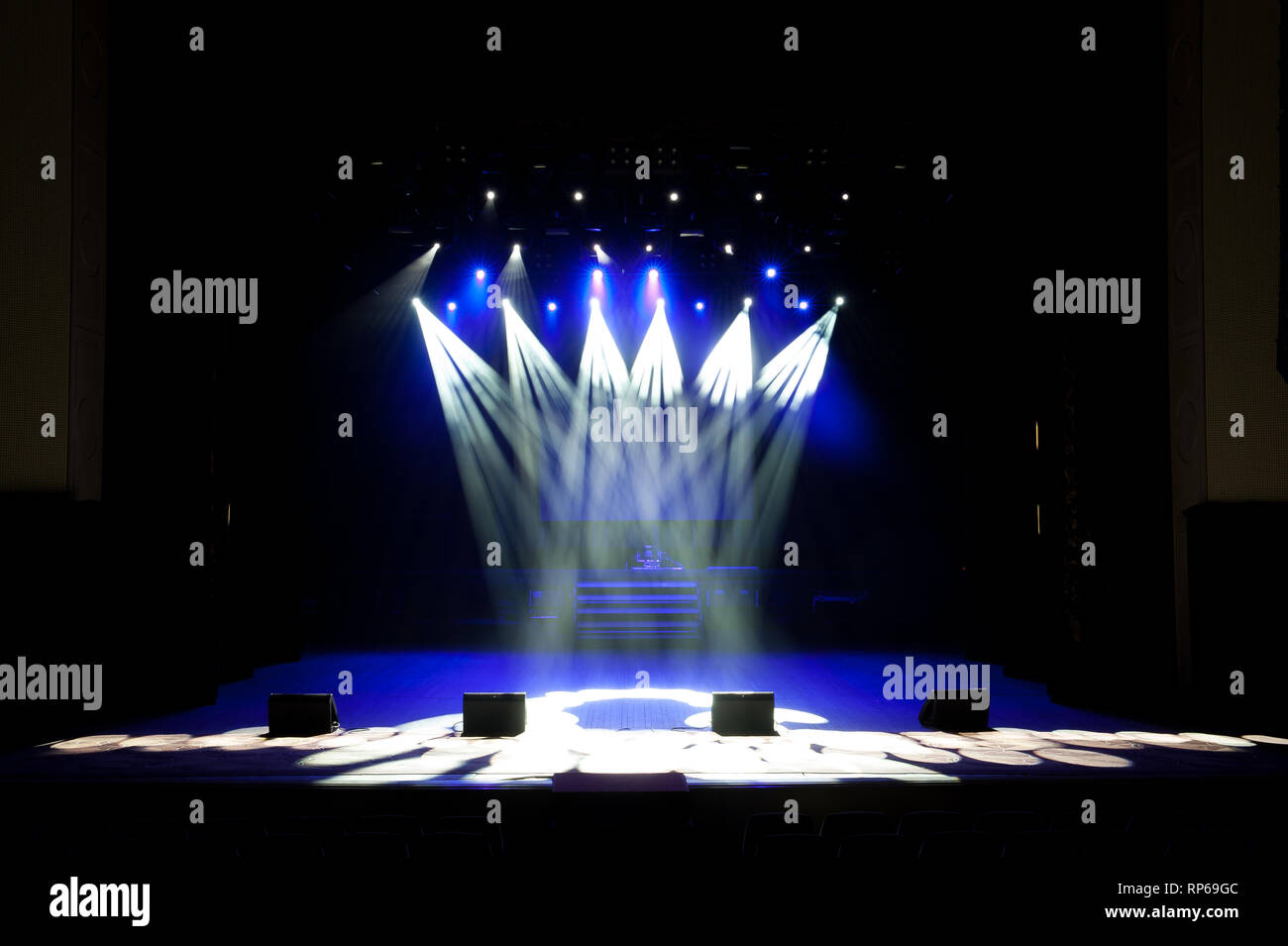Free stage with lights, lighting devices. Night show Stock Photo - Alamy
