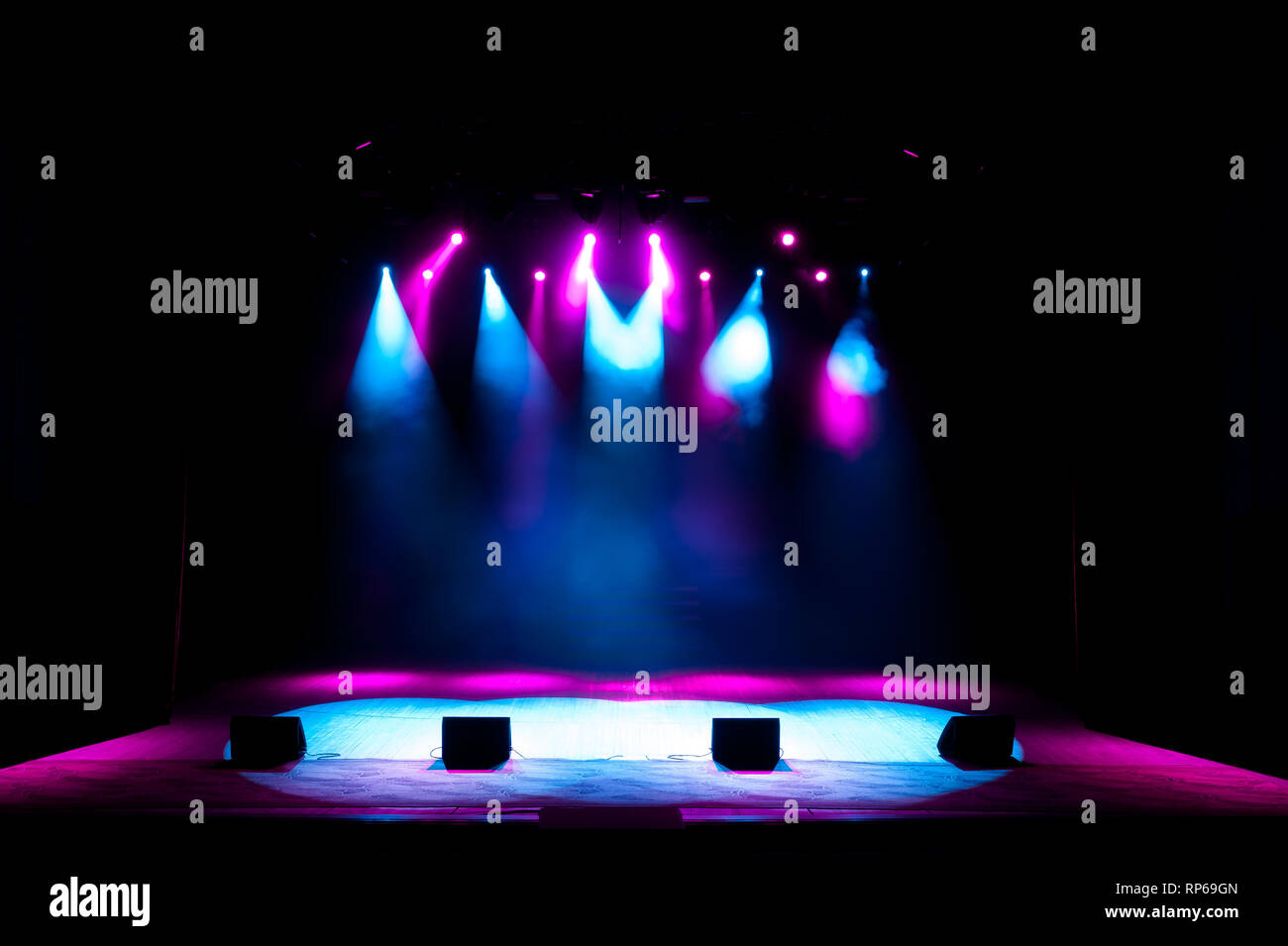 Free stage with lights, lighting devices. Night show Stock Photo - Alamy