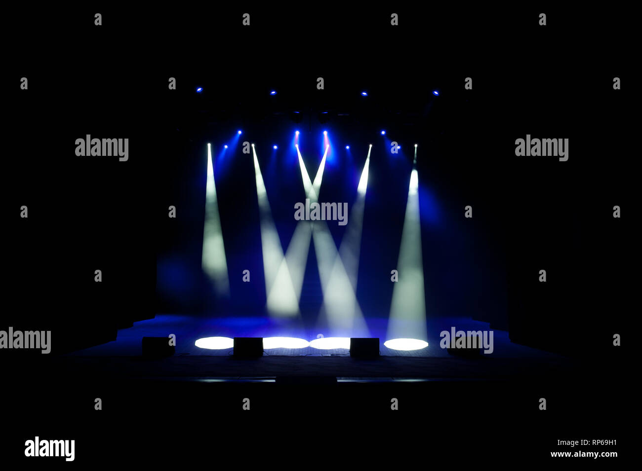 Free stage with lights, lighting devices. Night show Stock Photo - Alamy