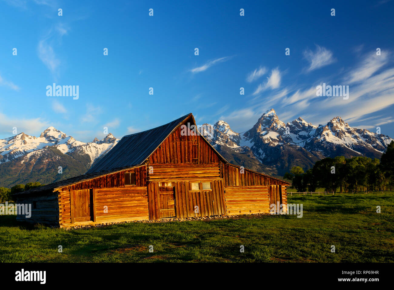 Historic Mormon Barn with Grand Teton National Park Rocky Mountains in ...