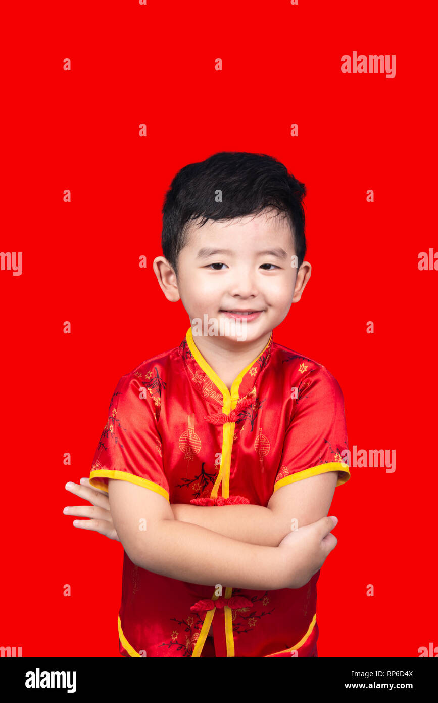 Chinese New Year Concept, Cute Asian boy in red traditional Chinese ...