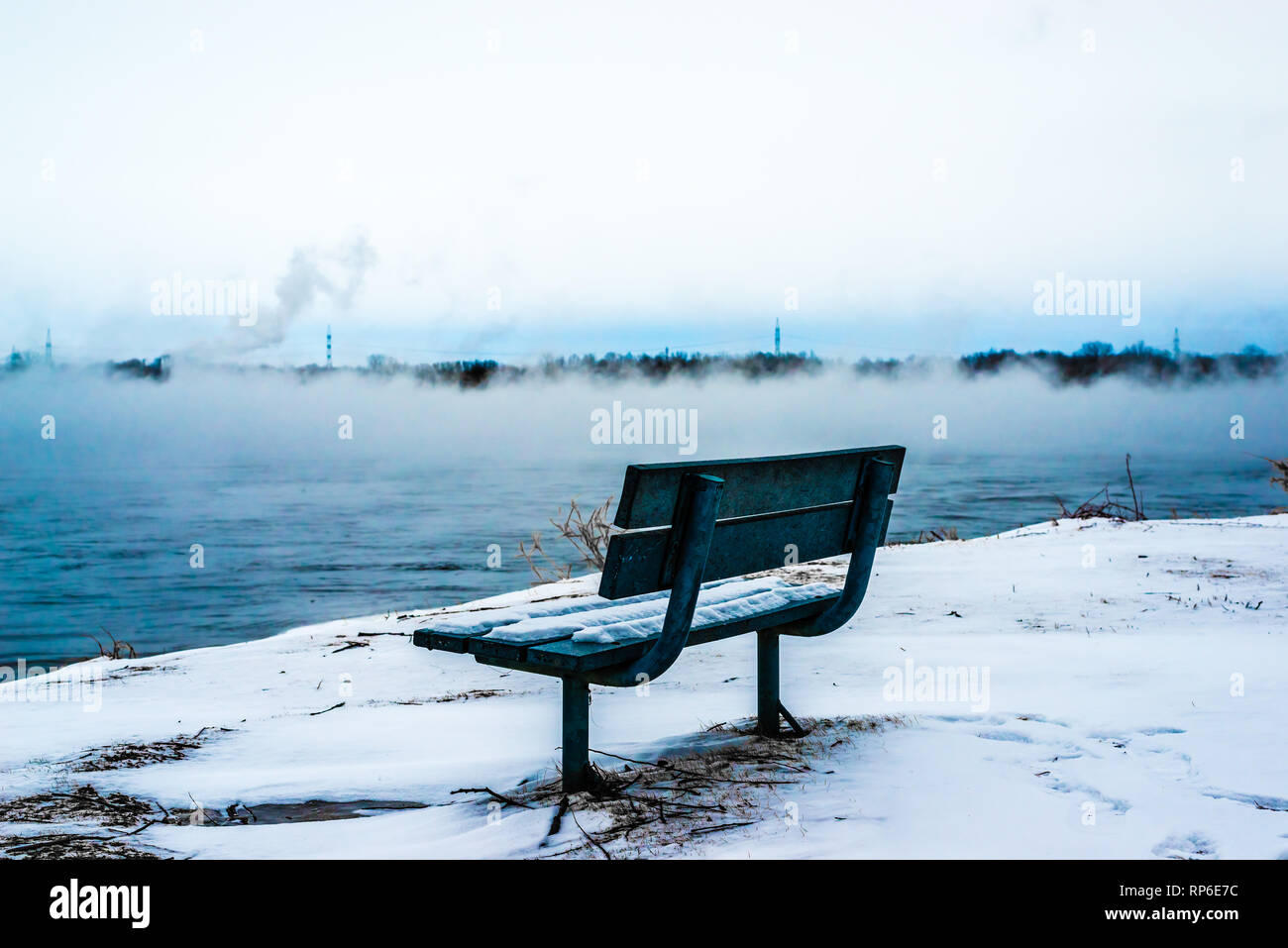 Bench by the river Stock Photo - Alamy