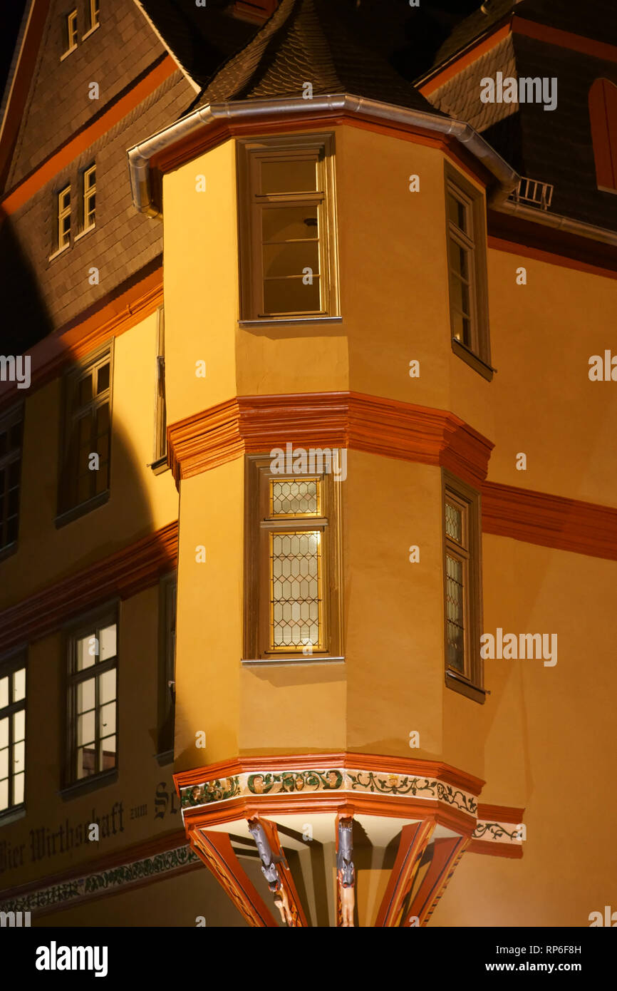 The ornamented bay window of a listed residential building at night ...