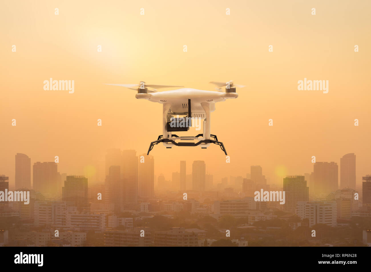 Drone flying to measure dust particles in the air over metropolis ...