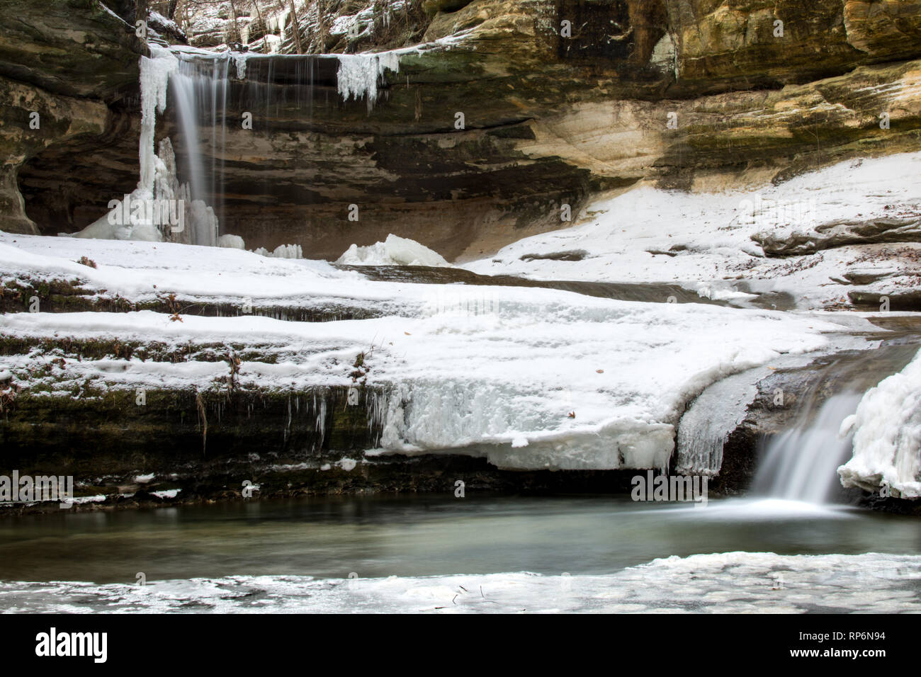 Frozen waterfall and snow in aSale canyon, Starved Rock state park ...