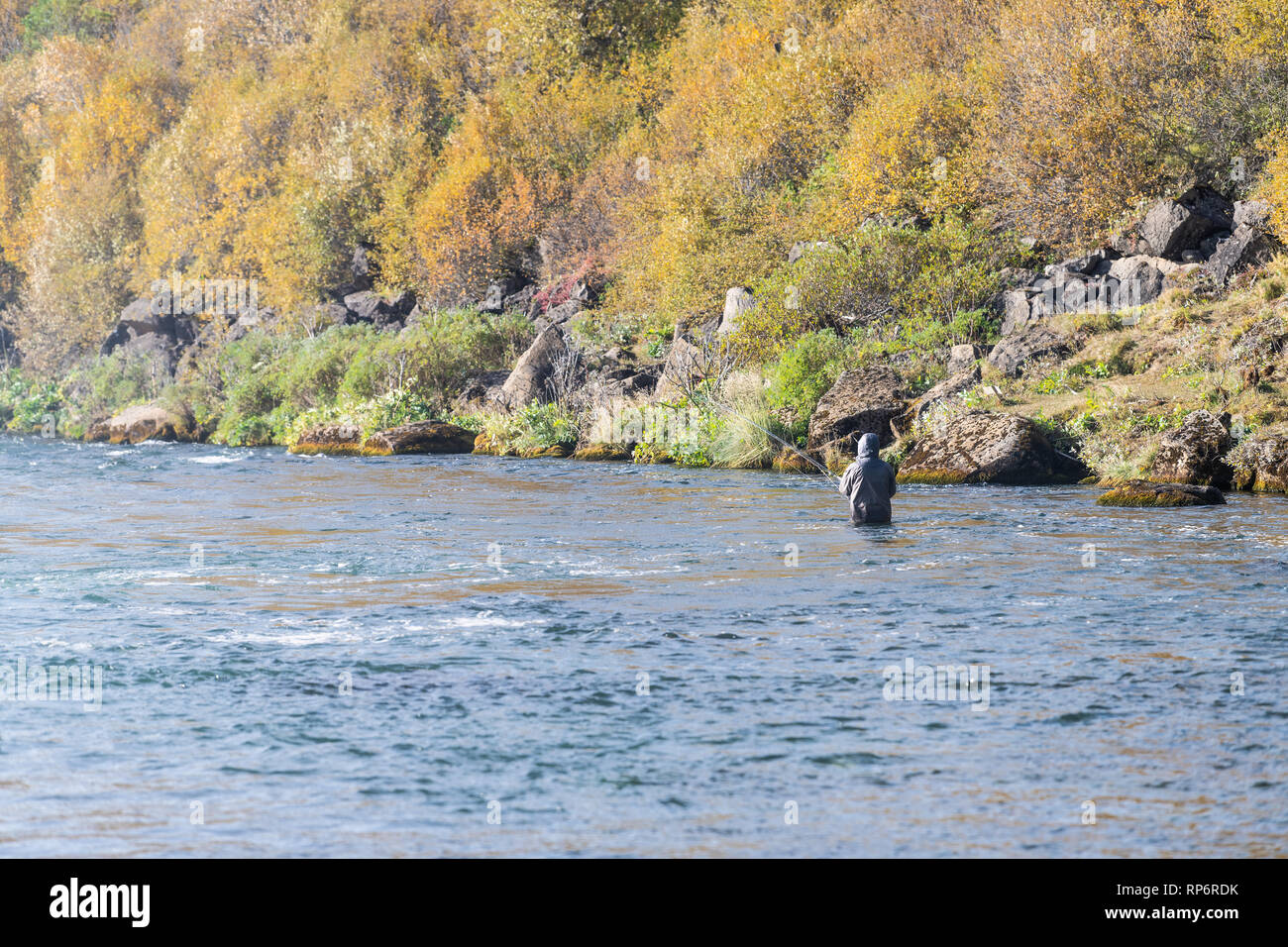 Faxafoss, Icenald and man fishing by Faxi waterfall landscape in south ...