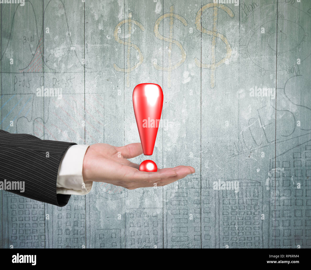 Hand holding red 3D exclamation point Stock Photo - Alamy