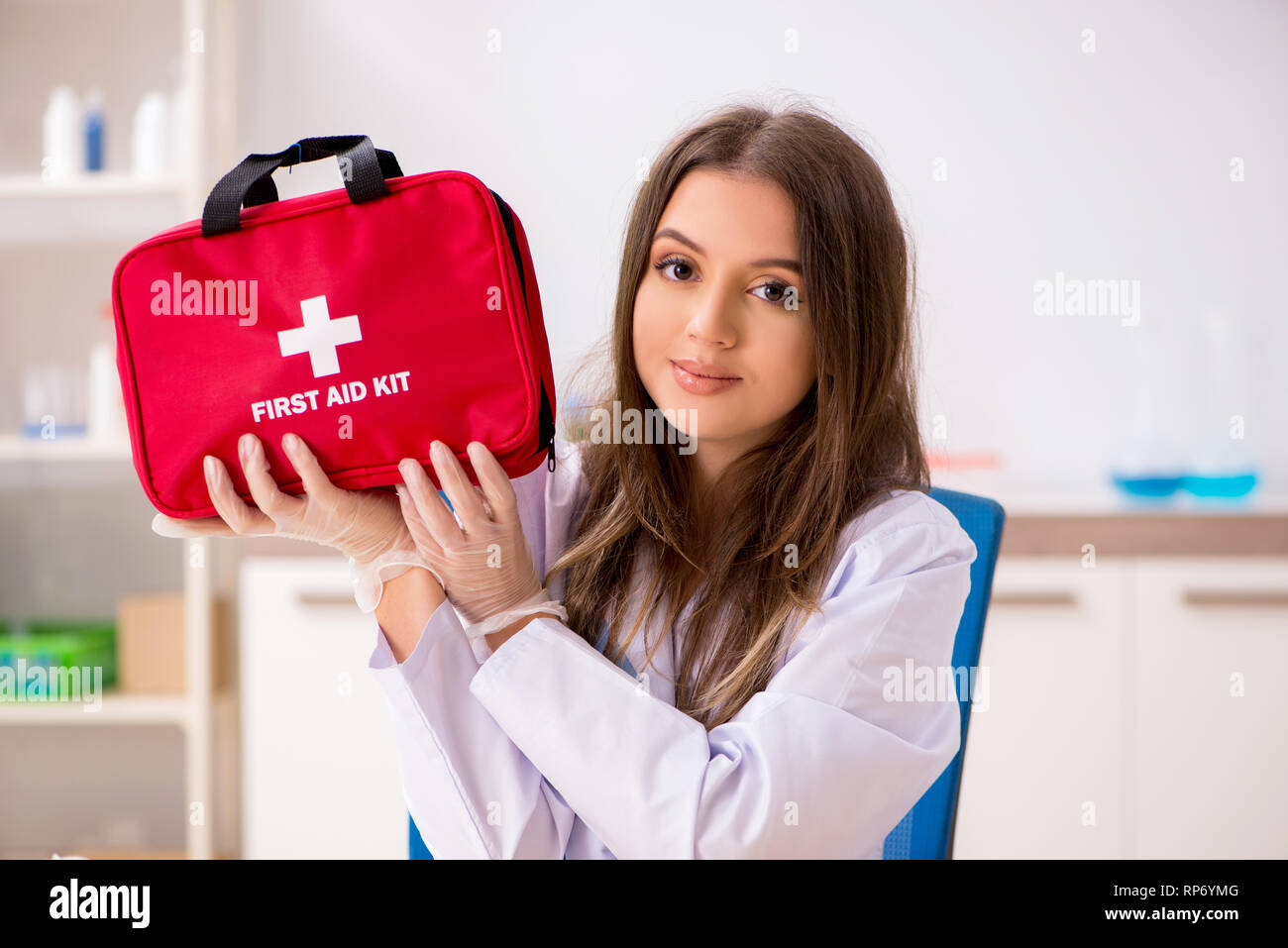 Female beautiful doctor with first aid bag Stock Photo - Alamy
