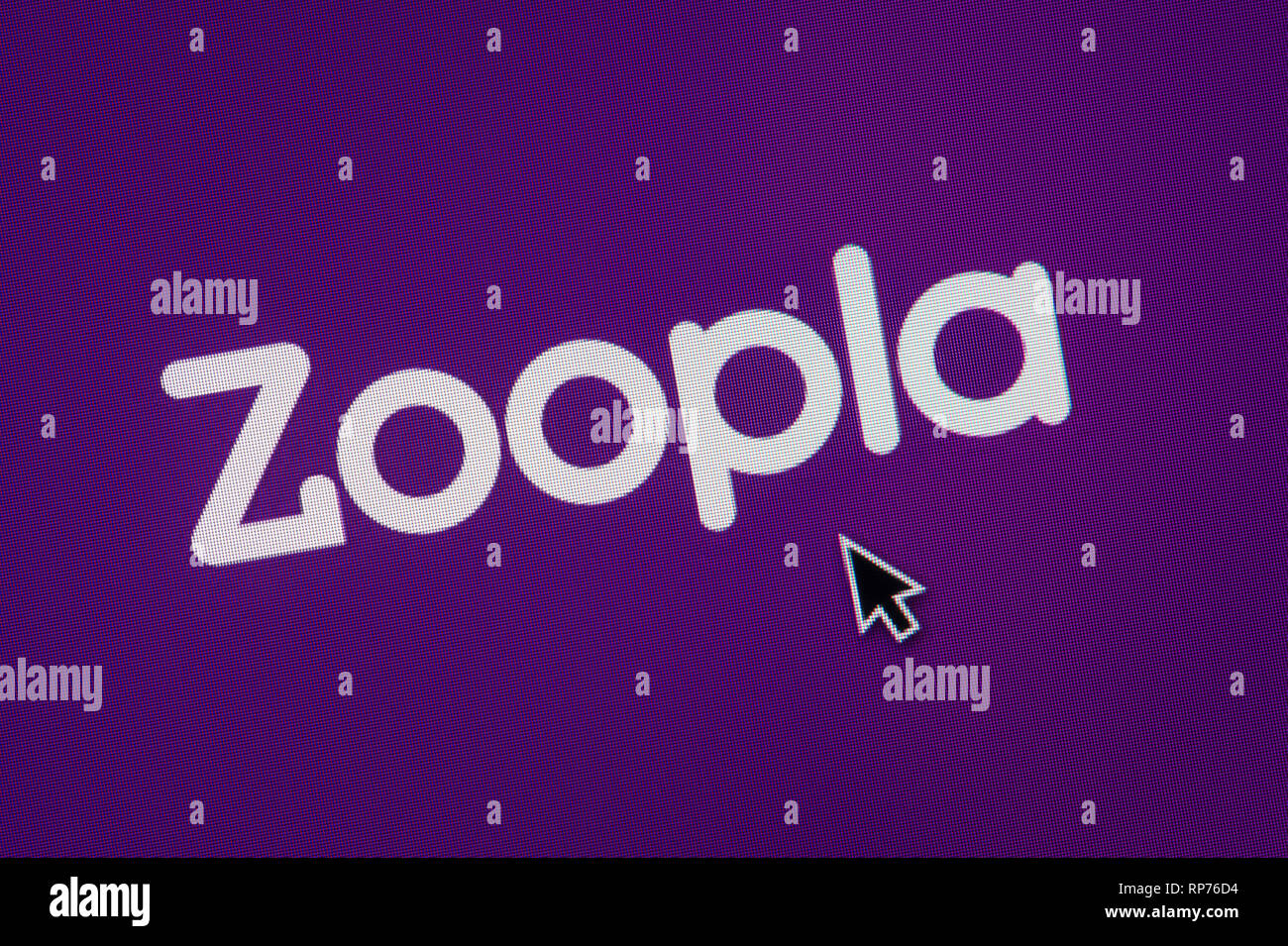 The logo of Zoopla is seen on a computer screen along with a mouse ...