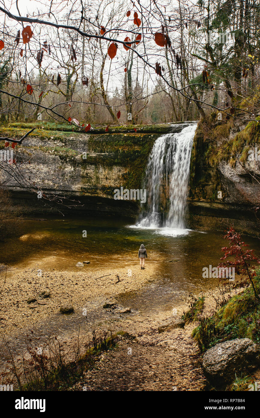 Waterfall in forest. The erosion from the waterfall formed the rock to ...