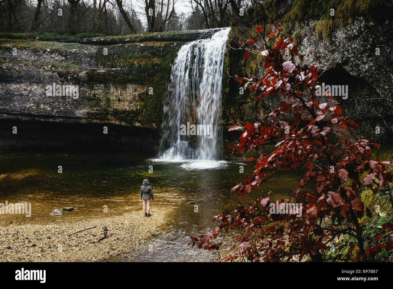 Waterfall in forest. The erosion from the waterfall formed the rock to ...