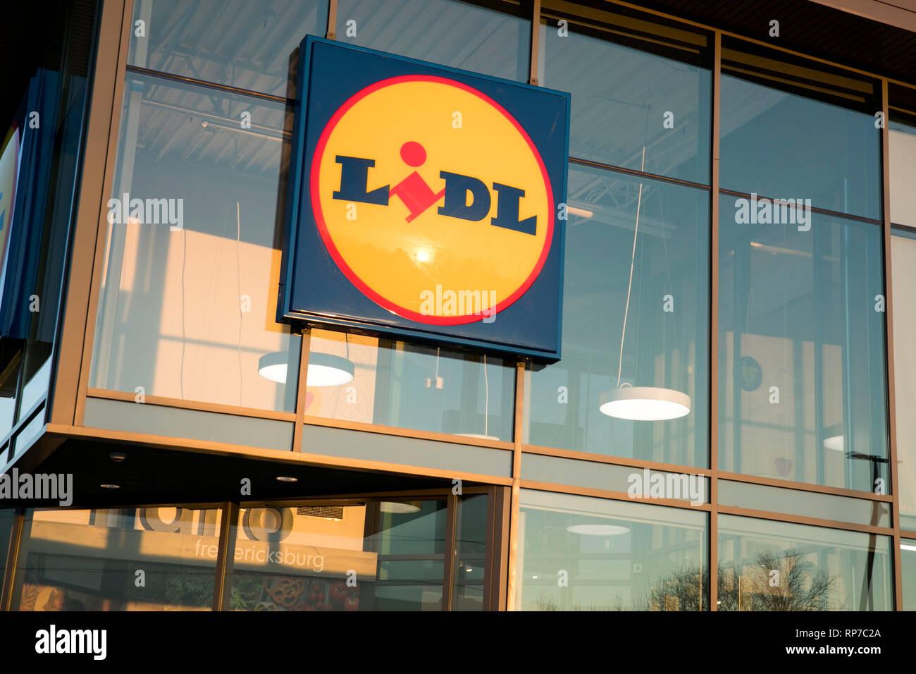 Lidl logo on the building of a lidl store hi-res stock photography and ...