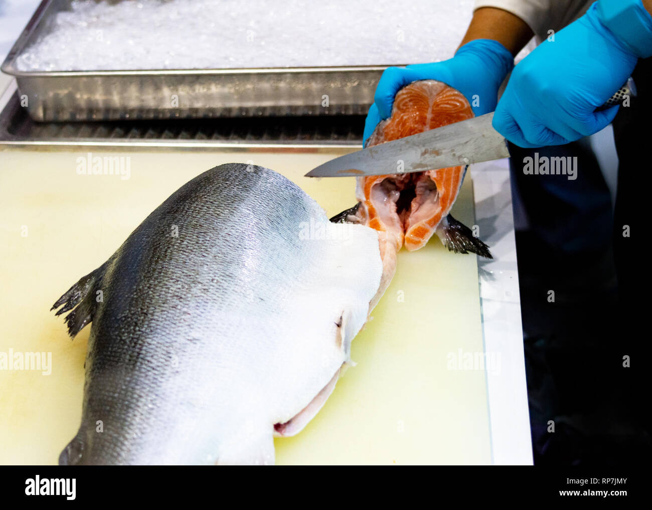 Professional chef slicing fresh red hi-res stock photography and images ...