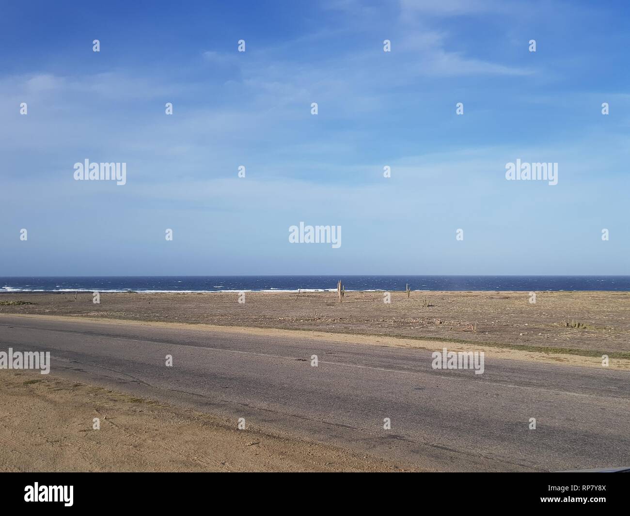 Nice roadside view of Aruban beach Stock Photo - Alamy