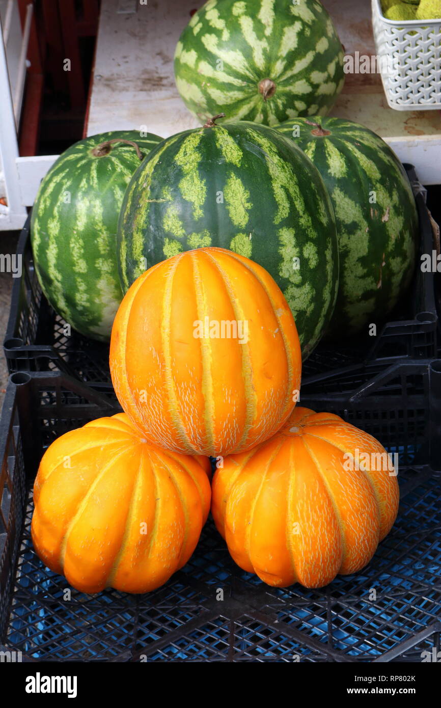 Trade in the market. Watermelons and melons Stock Photo - Alamy