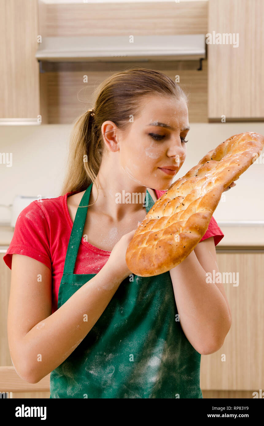 Woman smelling baked cookies hi-res stock photography and images - Alamy