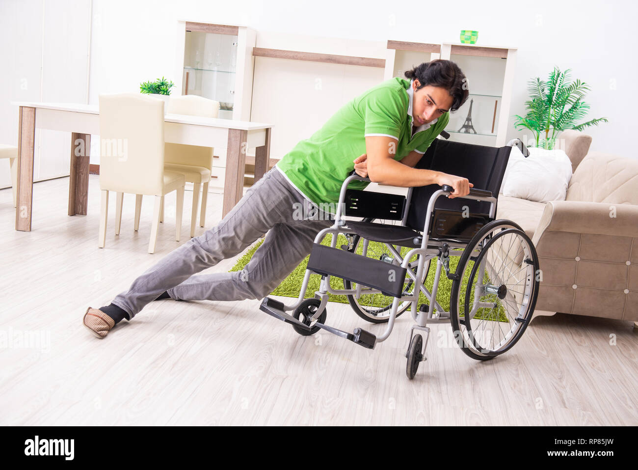Fall falling wheelchair disabled hi-res stock photography and images ...