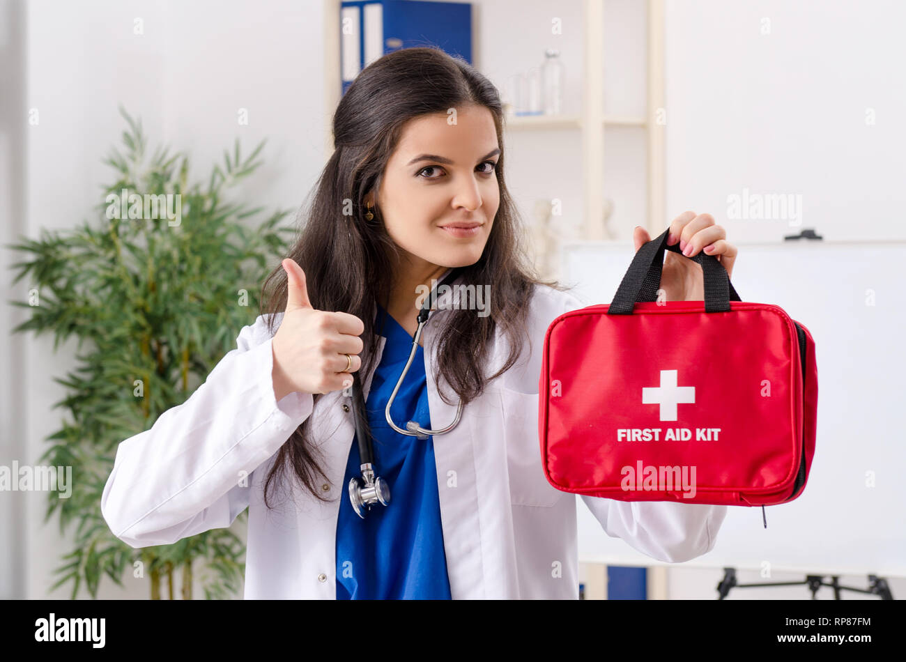 Female doctor in first aid concept Stock Photo - Alamy