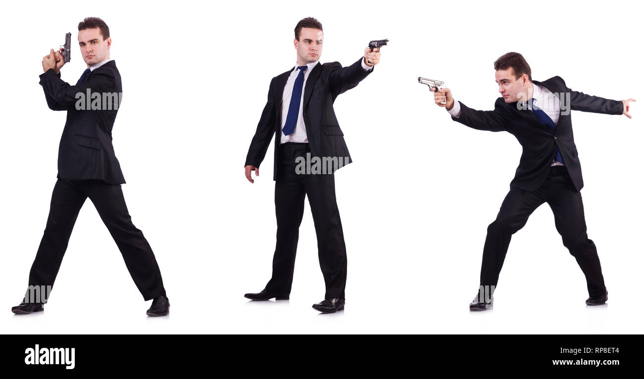 Man in suit with gun isolated on white Stock Photo - Alamy