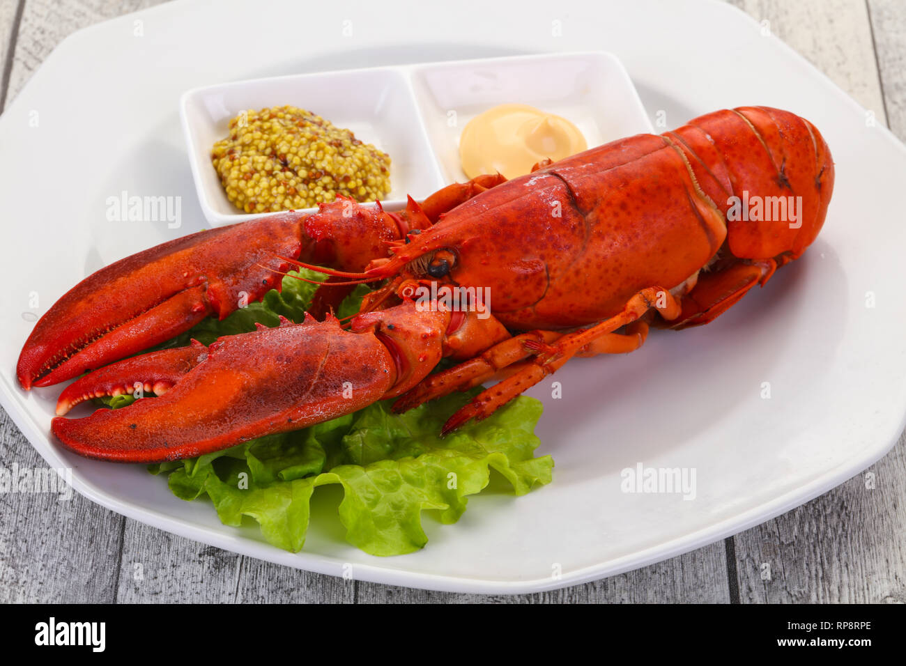 Luxury Lobster with sauces - ready for eat Stock Photo - Alamy