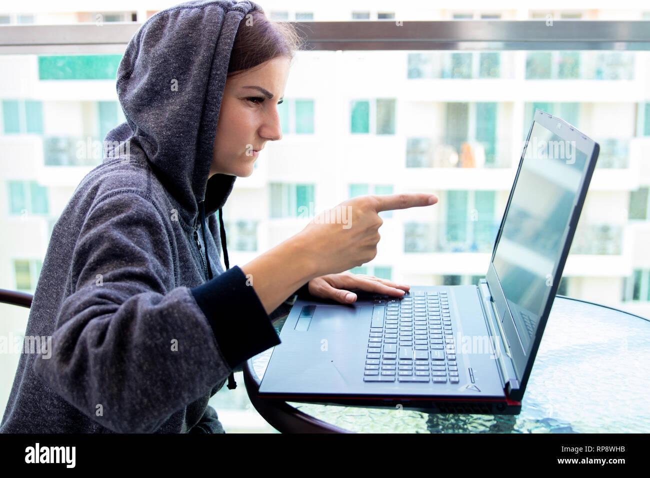 Woman Hacker Programmer Is Working On Computer In Cyber Security Center Filled With Display