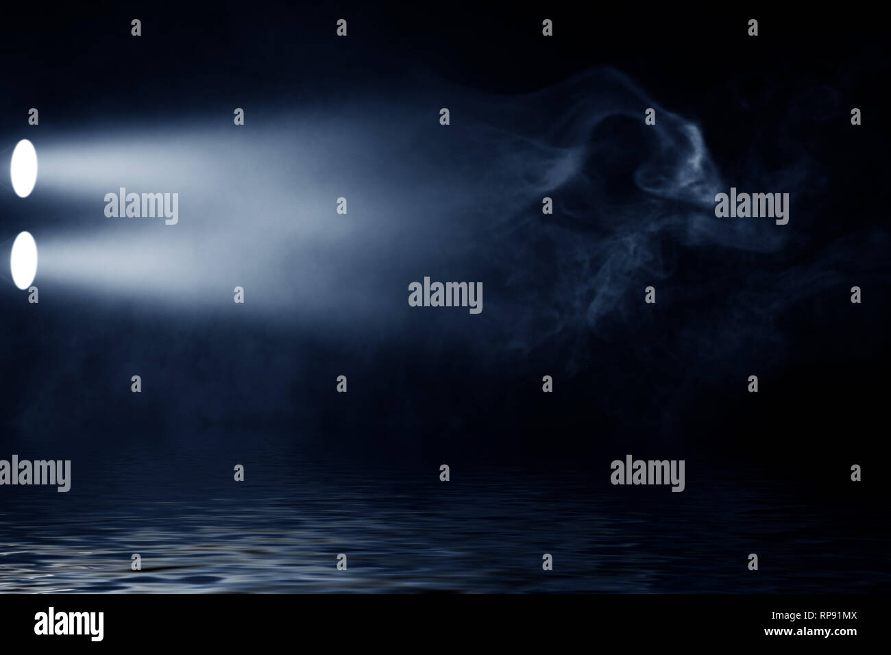 Projector spotlight with reflection in water. Isolated on black ...