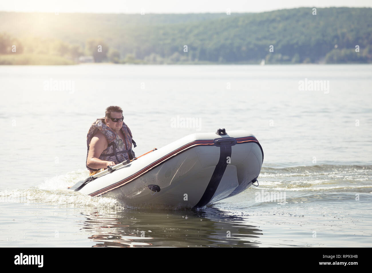 Man With Oar Motor Boat High Resolution Stock Photography and Images ...