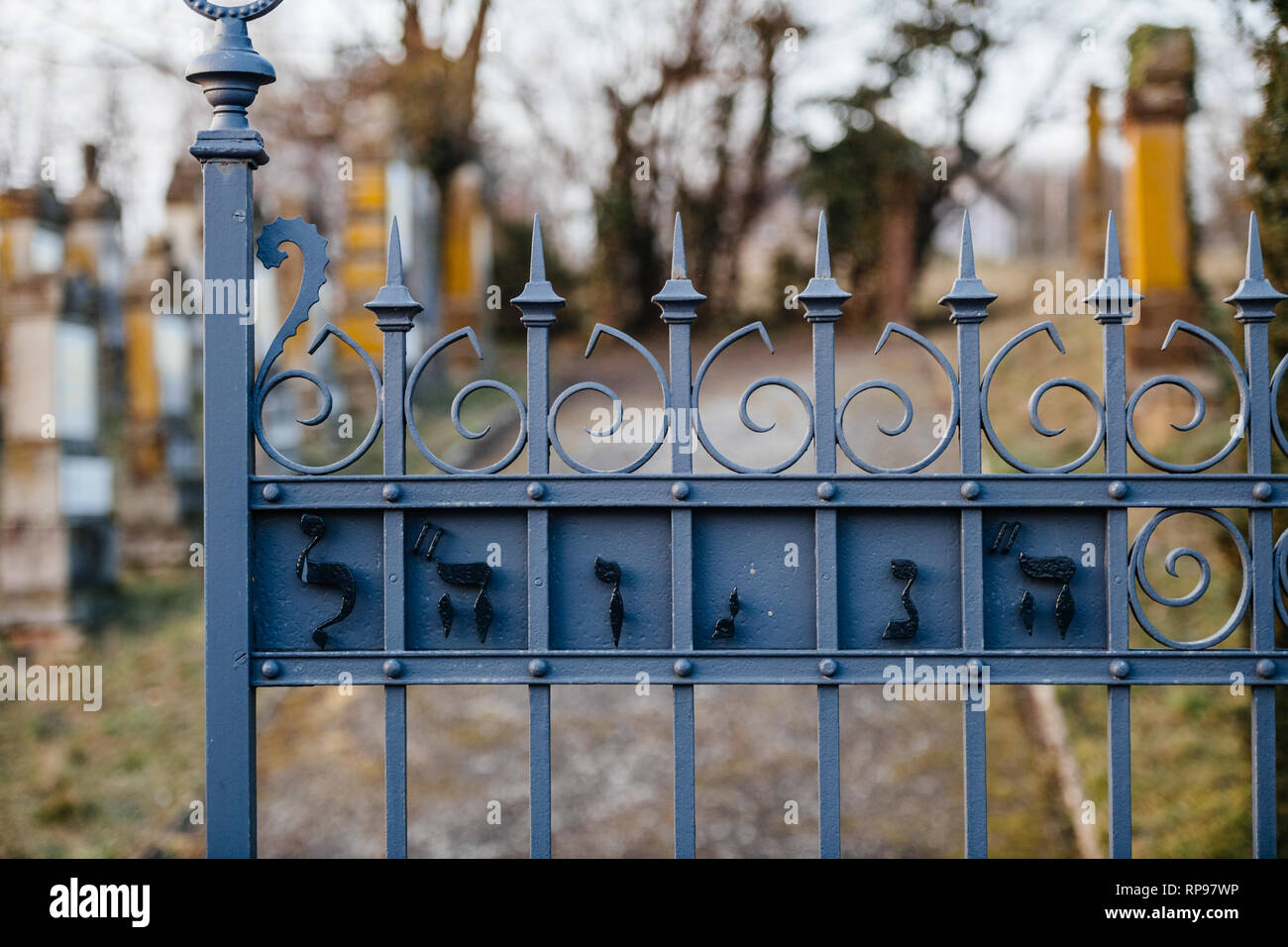 Hebrew text on the gate at the entrance to Jewish cemetery in ...