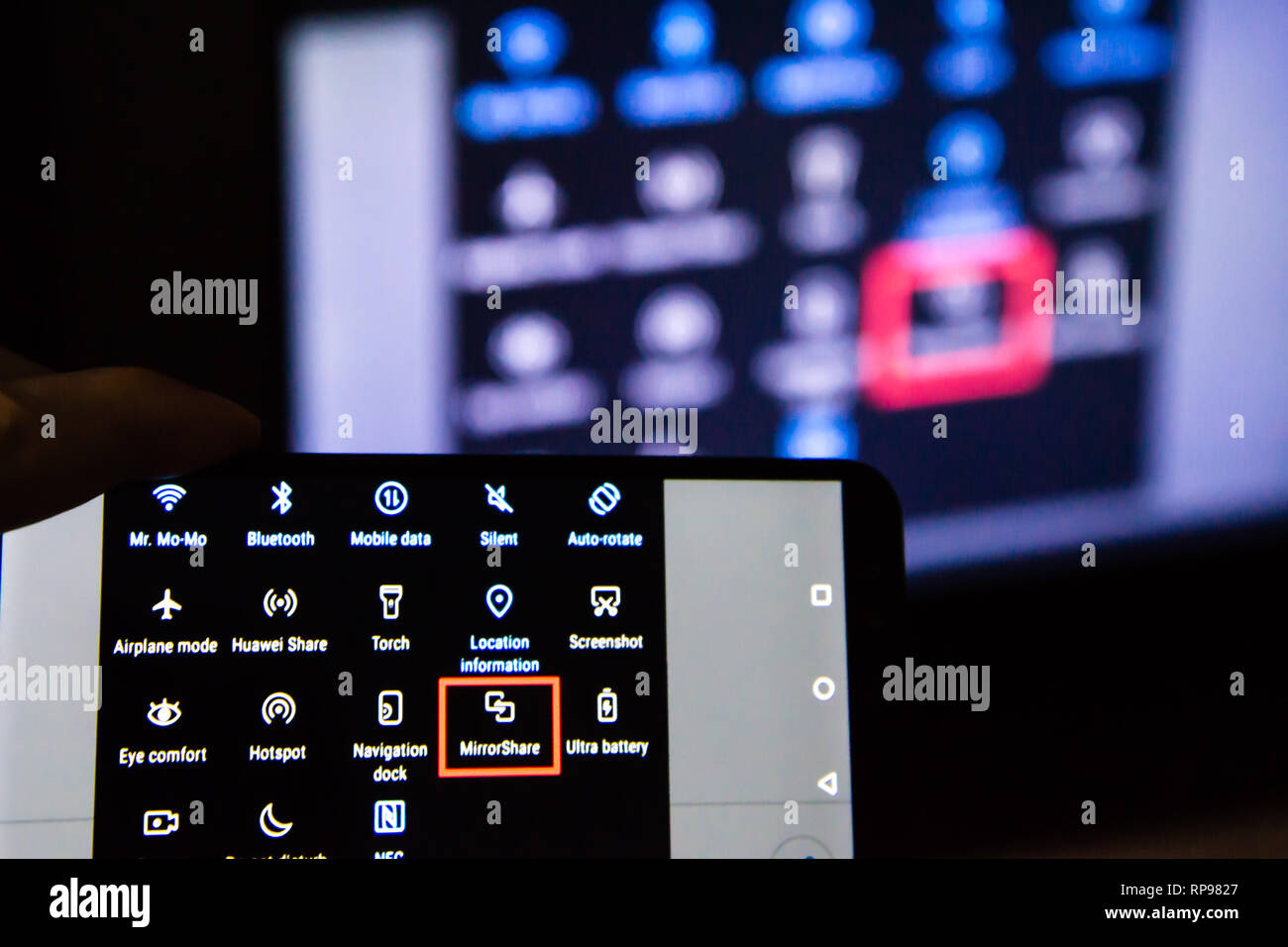 Los Angeles, California, USA - February 21, 2019. Hands holding a ...