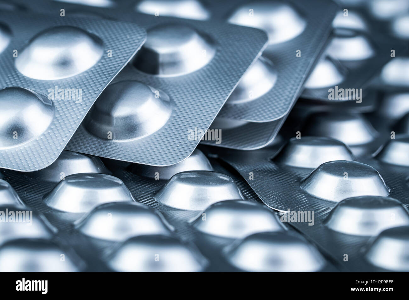 Pile of tablets pill in blister packaging to protect medicine from ...