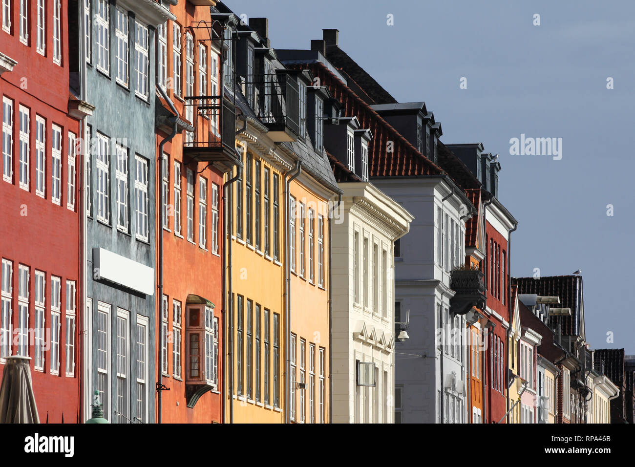 Copenhagen, Denmark - colorful buildings of Nyhavn street. Oresund ...