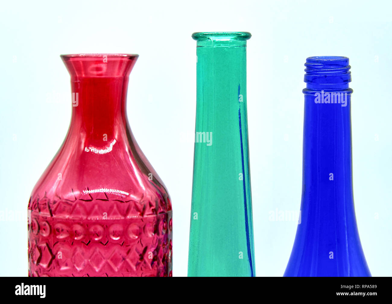 Multi-colored bottles. RGB paint. Isolated. red blue green Stock Photo ...