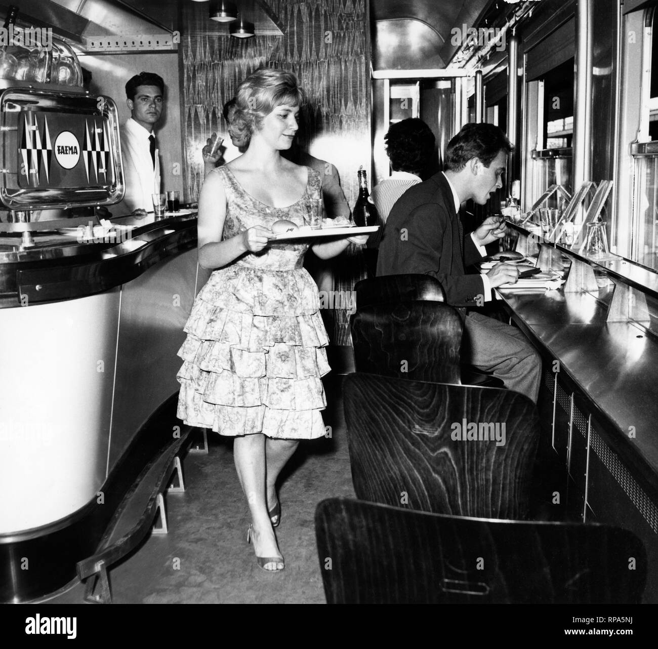 Dining coach Black and White Stock Photos & Images - Alamy