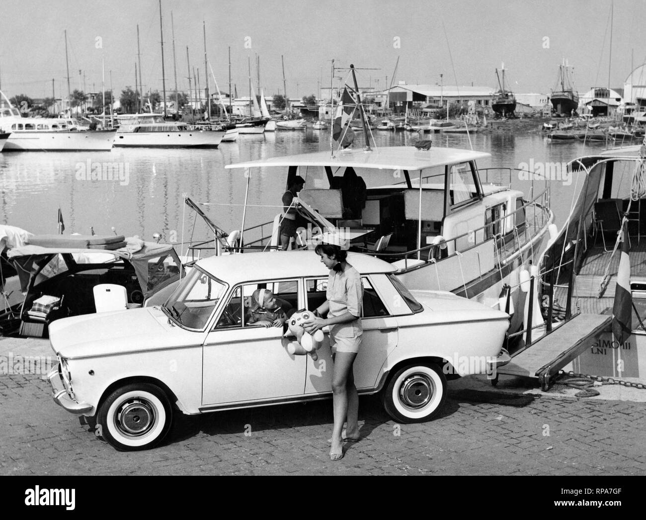 Woman with car 1963 Black and White Stock Photos & Images - Alamy