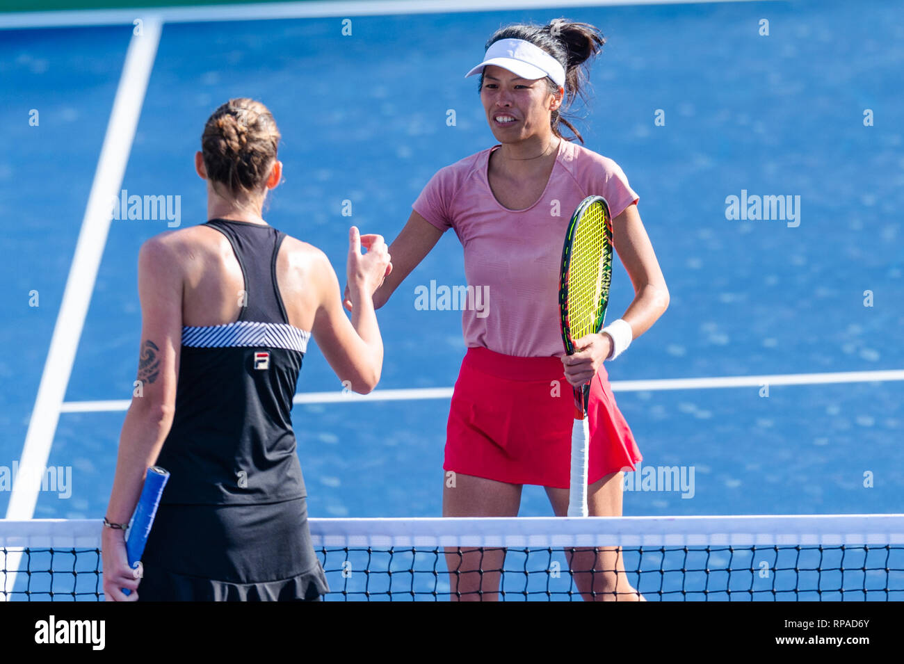 Dubai, UAE. 21st February, 2019. Su-Wei Hsieh of Taipei (right) shakes ...
