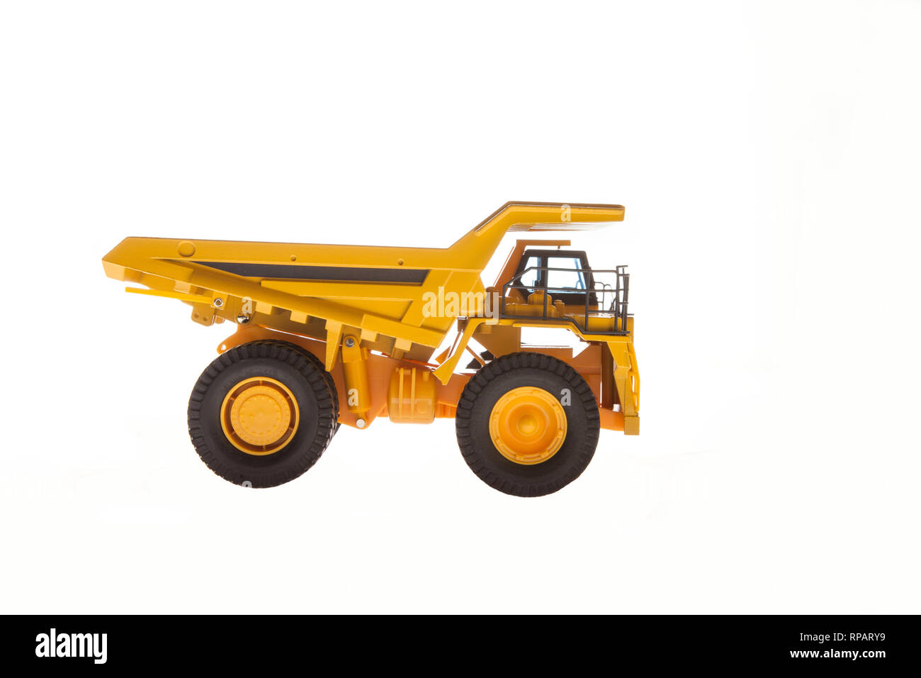 Excavator load sand heavy Cut Out Stock Images & Pictures - Alamy