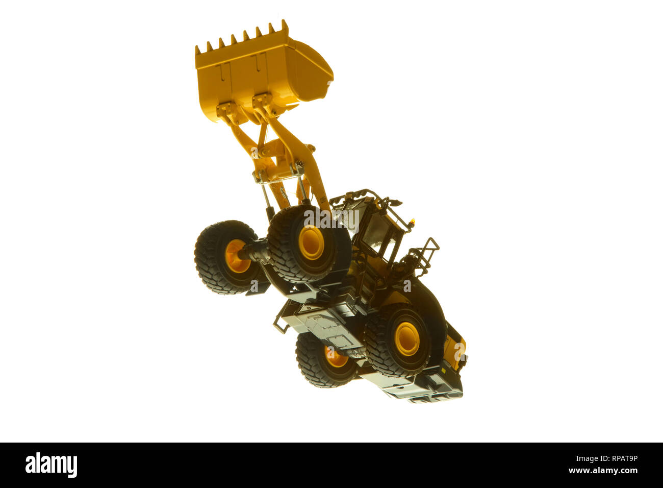 Wheel loader machinery low angle bottom balancing on 2 wheels Stock ...