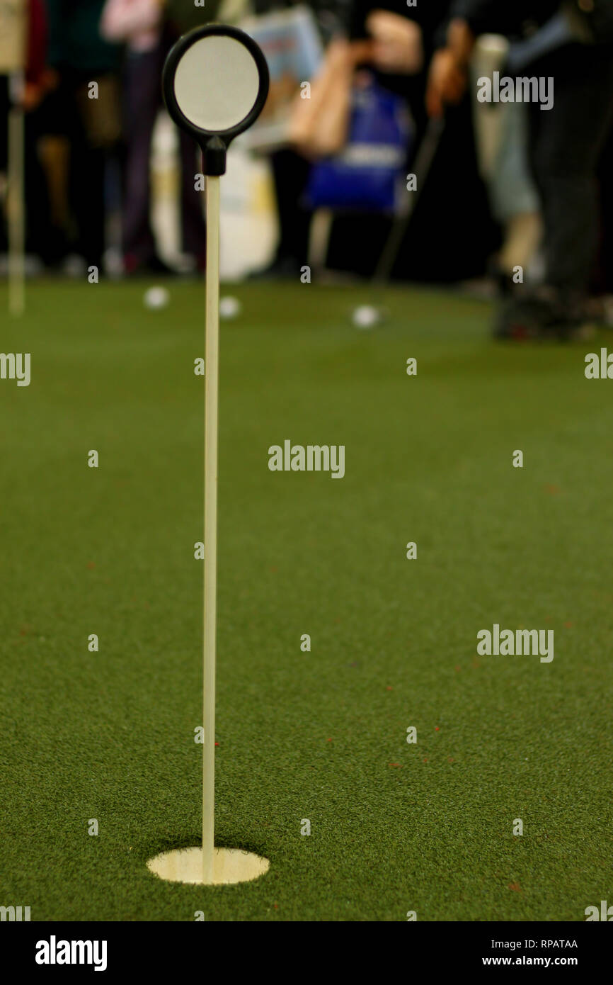 Golf hole to reach the goal with a part to write the message Stock ...