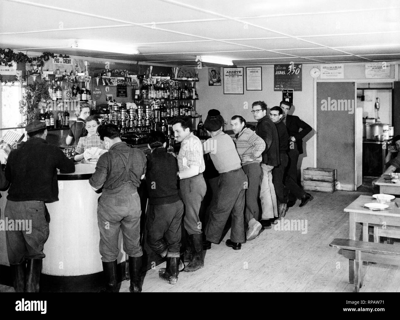 french workers at the bar during the works at the mont blanc tunnel ...