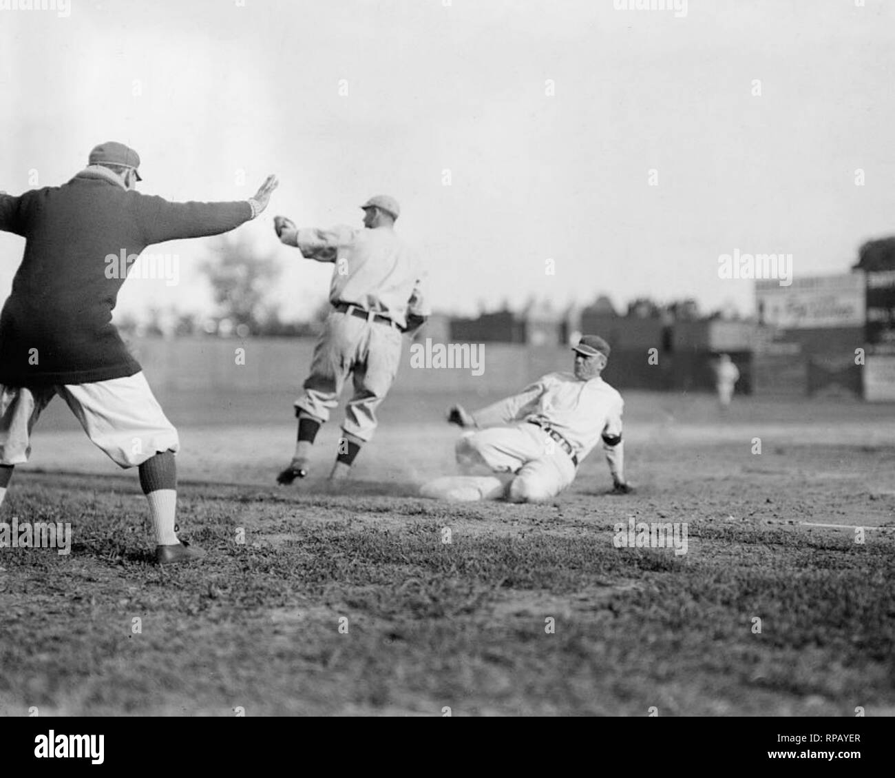Sliding safely into 3rd base 1911 Stock Photo - Alamy