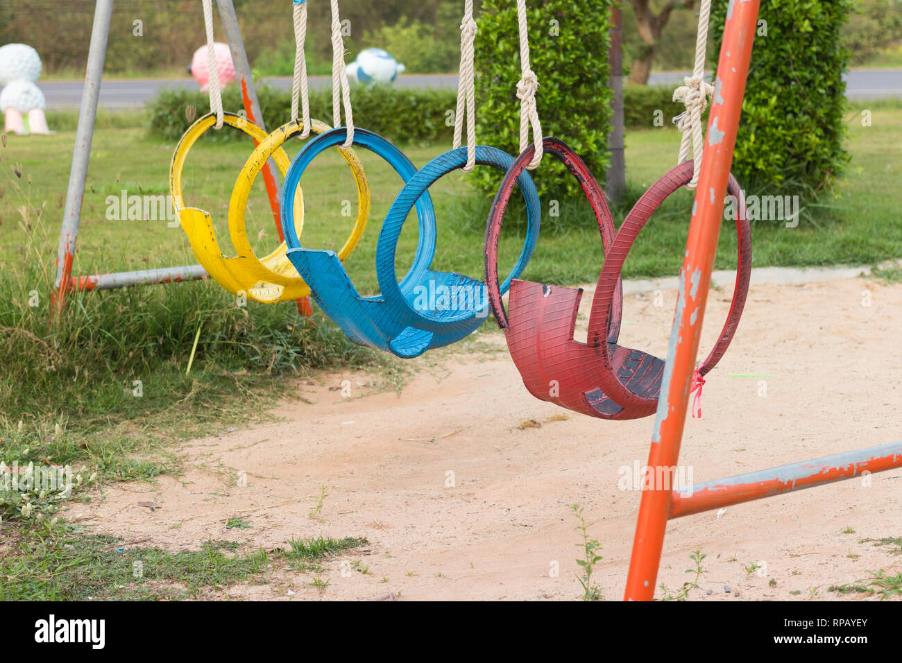 Swing in the playground Stock Photo - Alamy