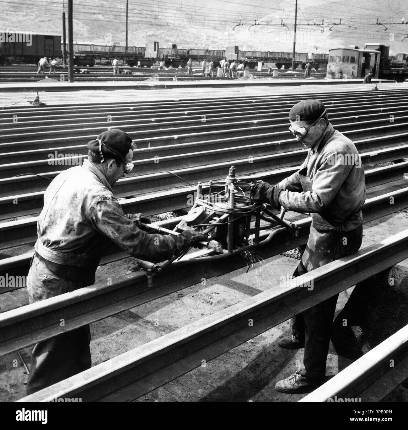 welding of the rails, italy 1963 Stock Photo - Alamy