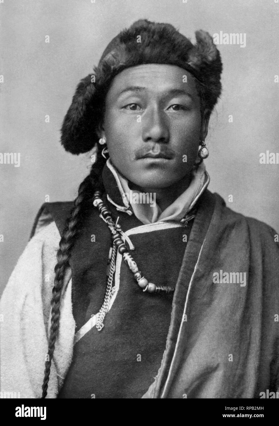 tibetan man, china, asia, 1920-30 Stock Photo - Alamy