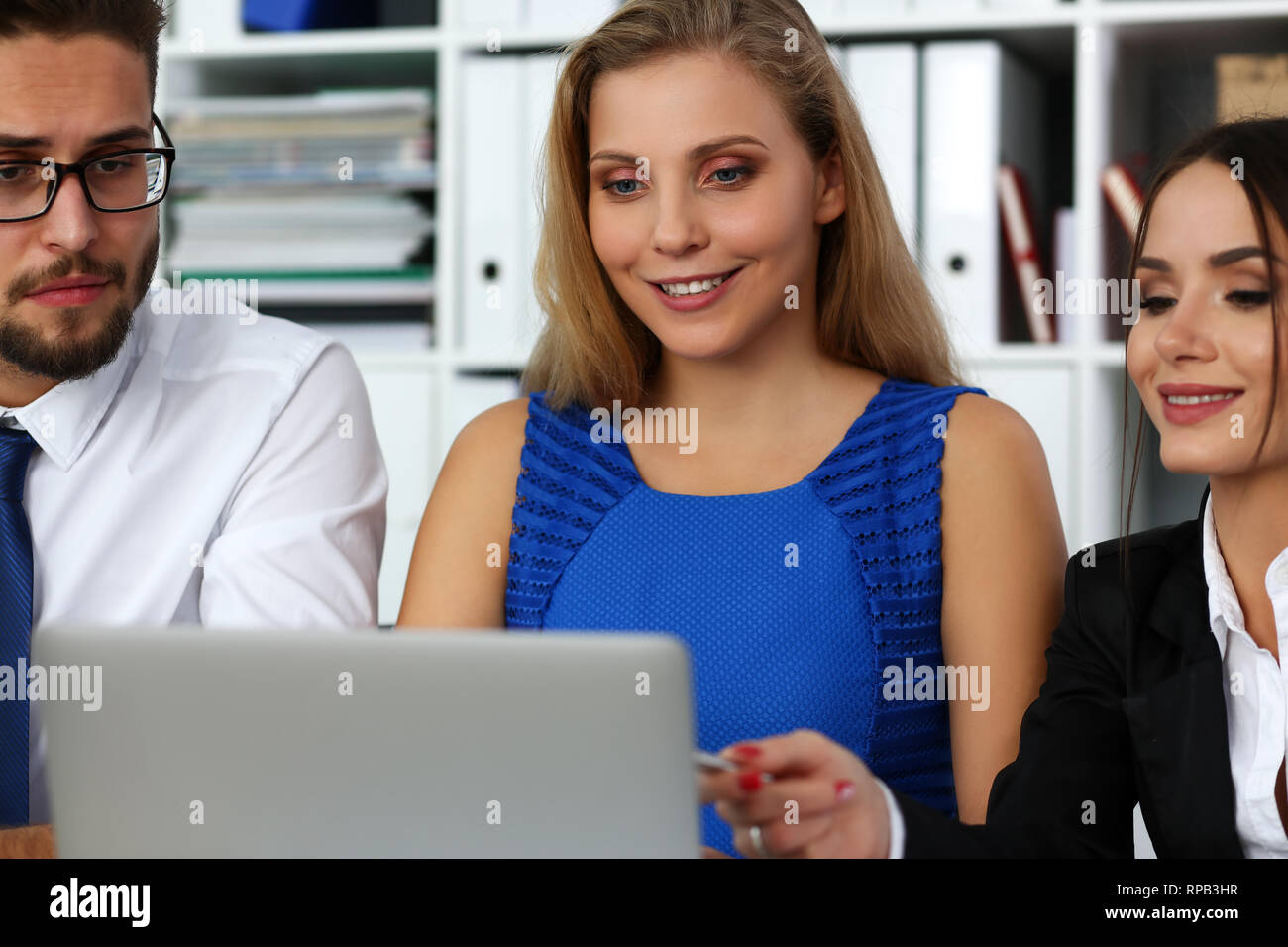 Group of people in office use laptop pc portrait Stock Photo - Alamy