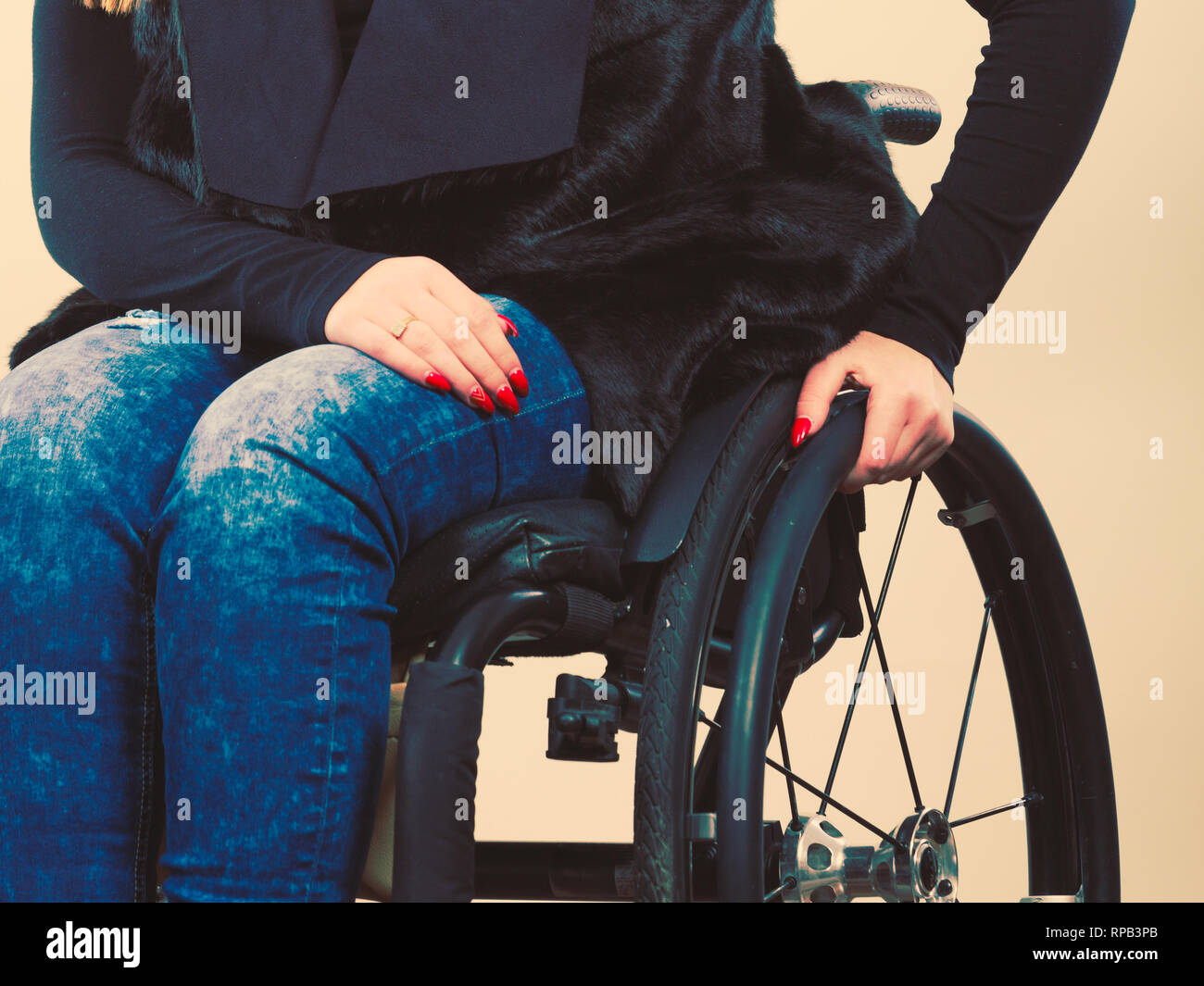Disability and handicap concept. Young teen handicapped girl sitting on ...