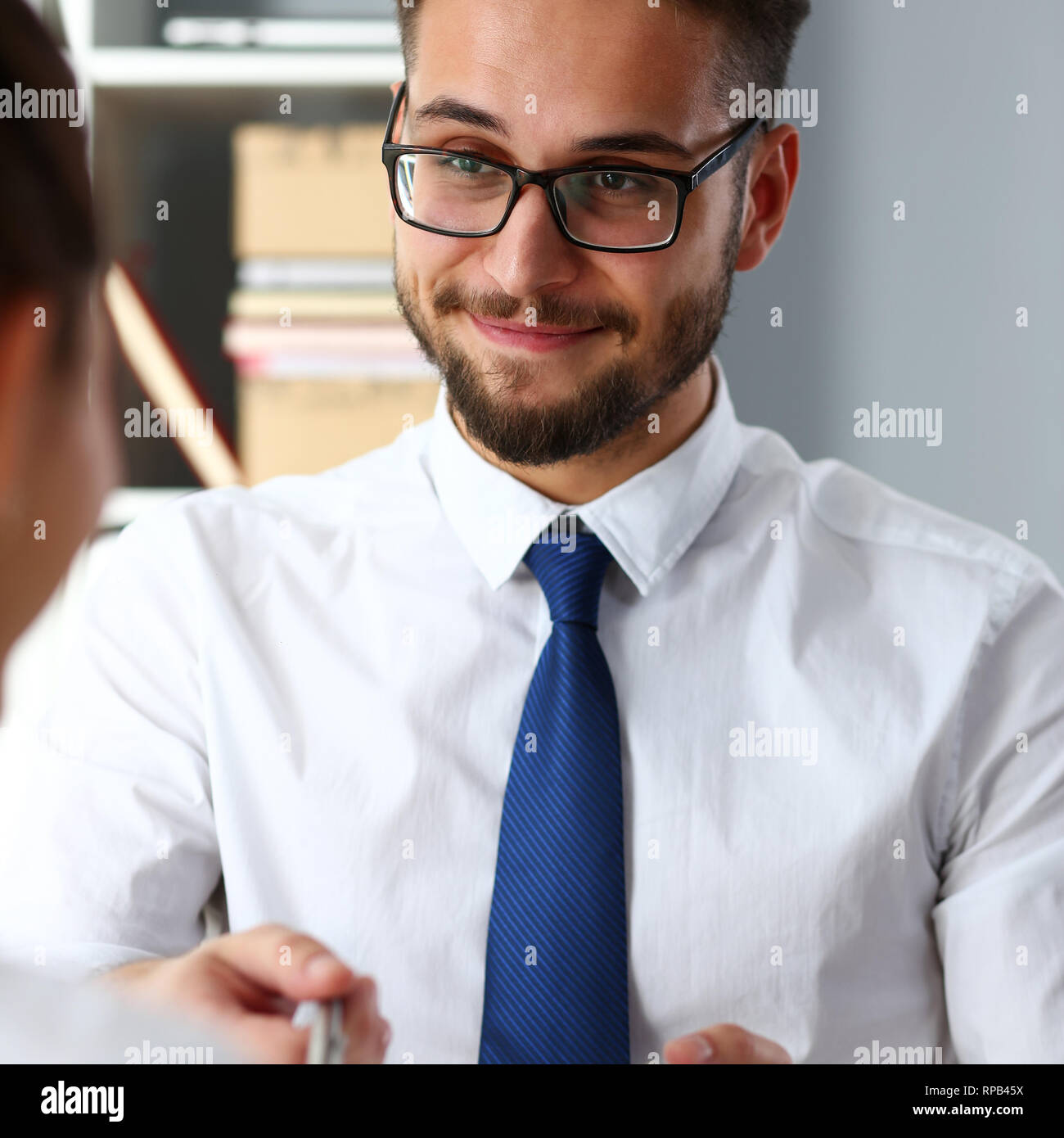 Handsome bearded man offer contract form on clipboard Stock Photo - Alamy