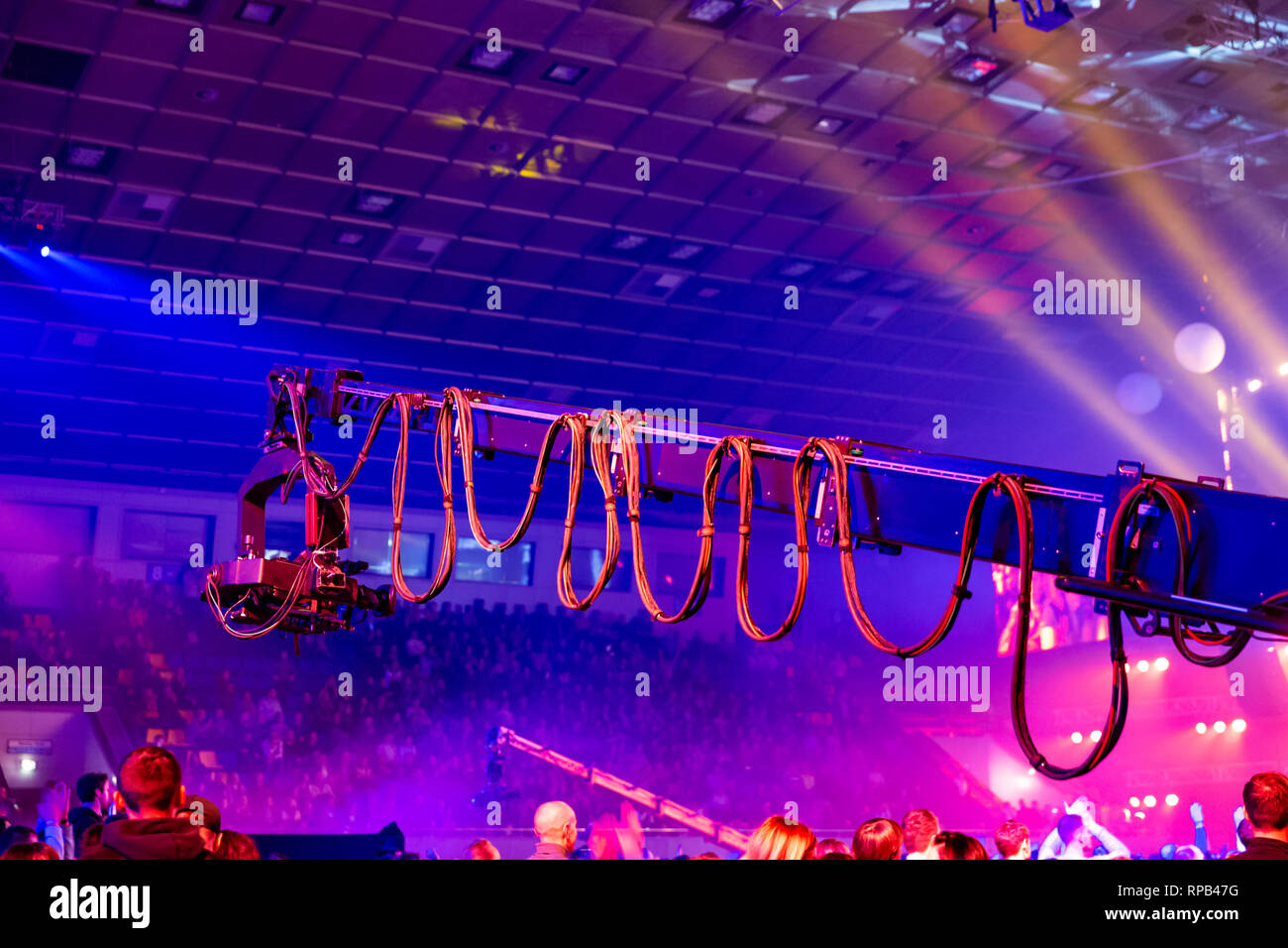 Telescopic crane with a video camera attached. Television is recording ...